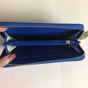 bebe | Bags | New Bebe Blue Zip Wallet W Gold Tassel | Poshmark